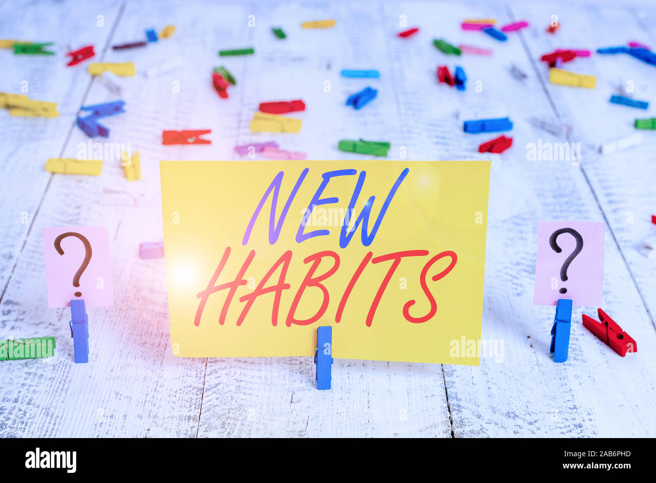 Writing note showing New Habits. Business concept for change the ...