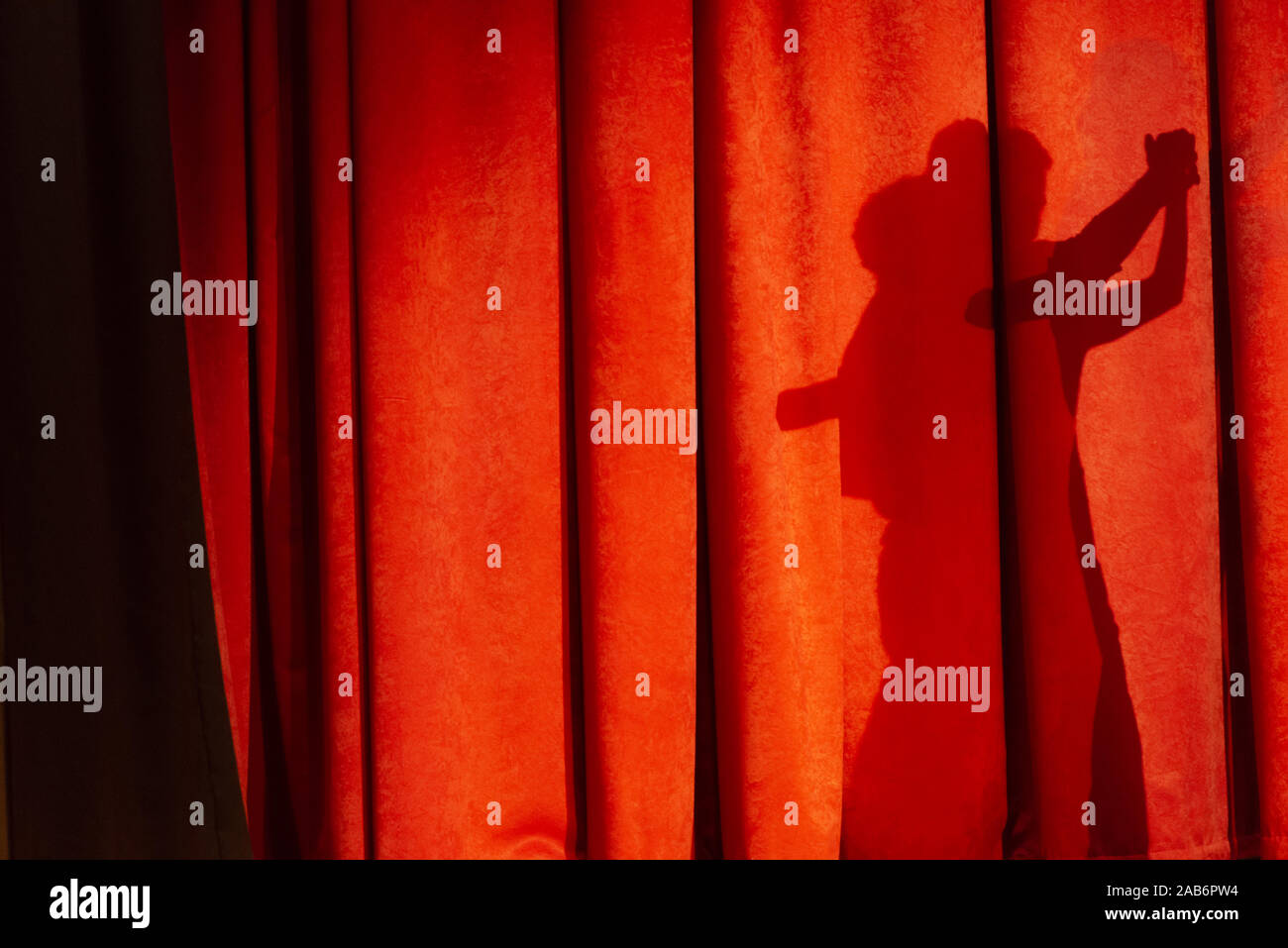 Shadow dancing on the curtain. Reflection dance on colored fabric Stock ...