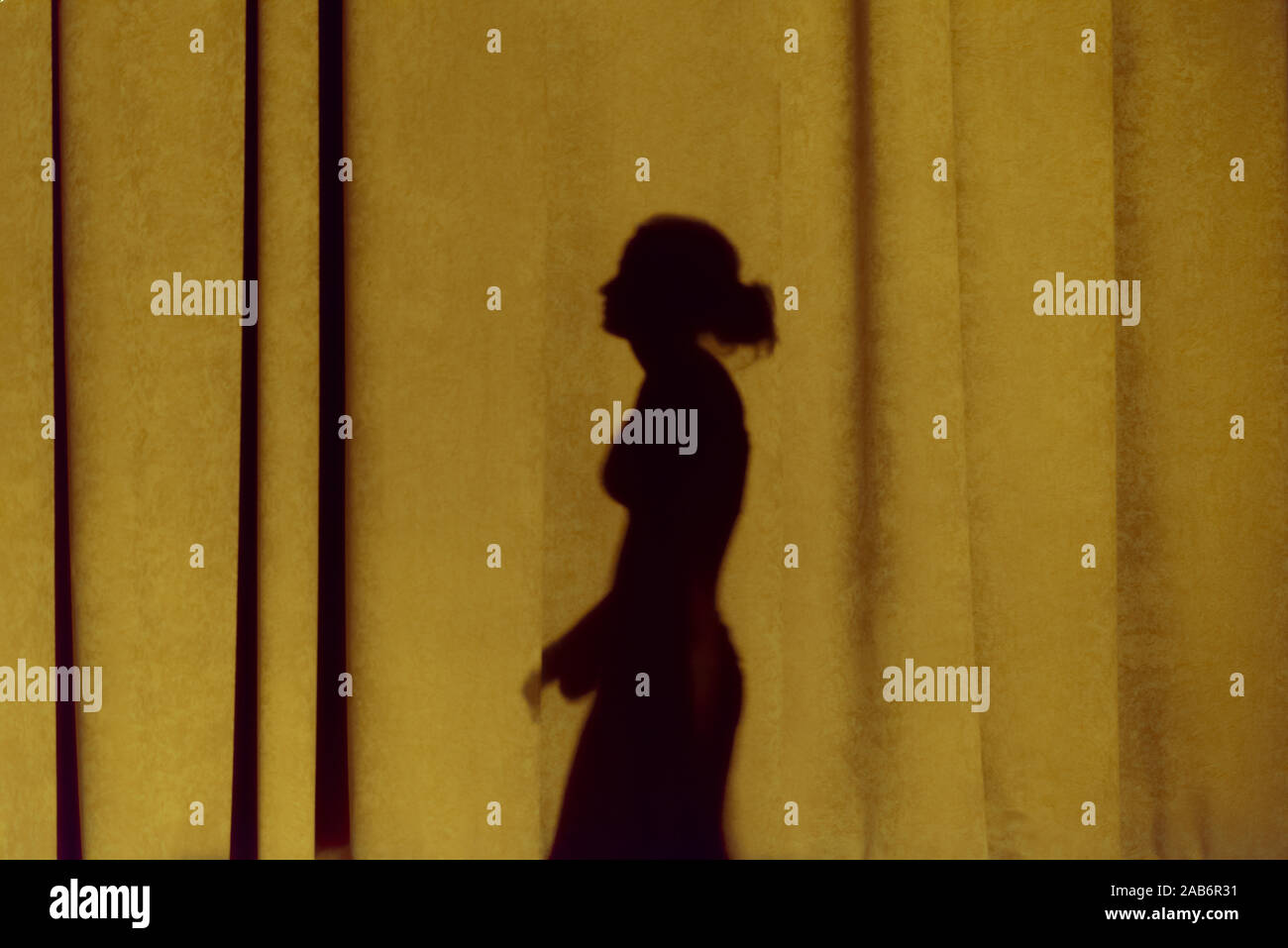 Shadow dancing on the curtain. Reflection dance on colored fabric Stock ...