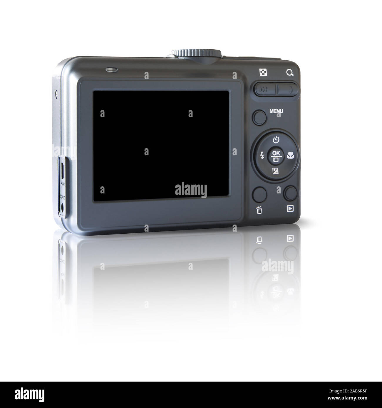 A photography of a camera standing up the white table Stock Photo - Alamy