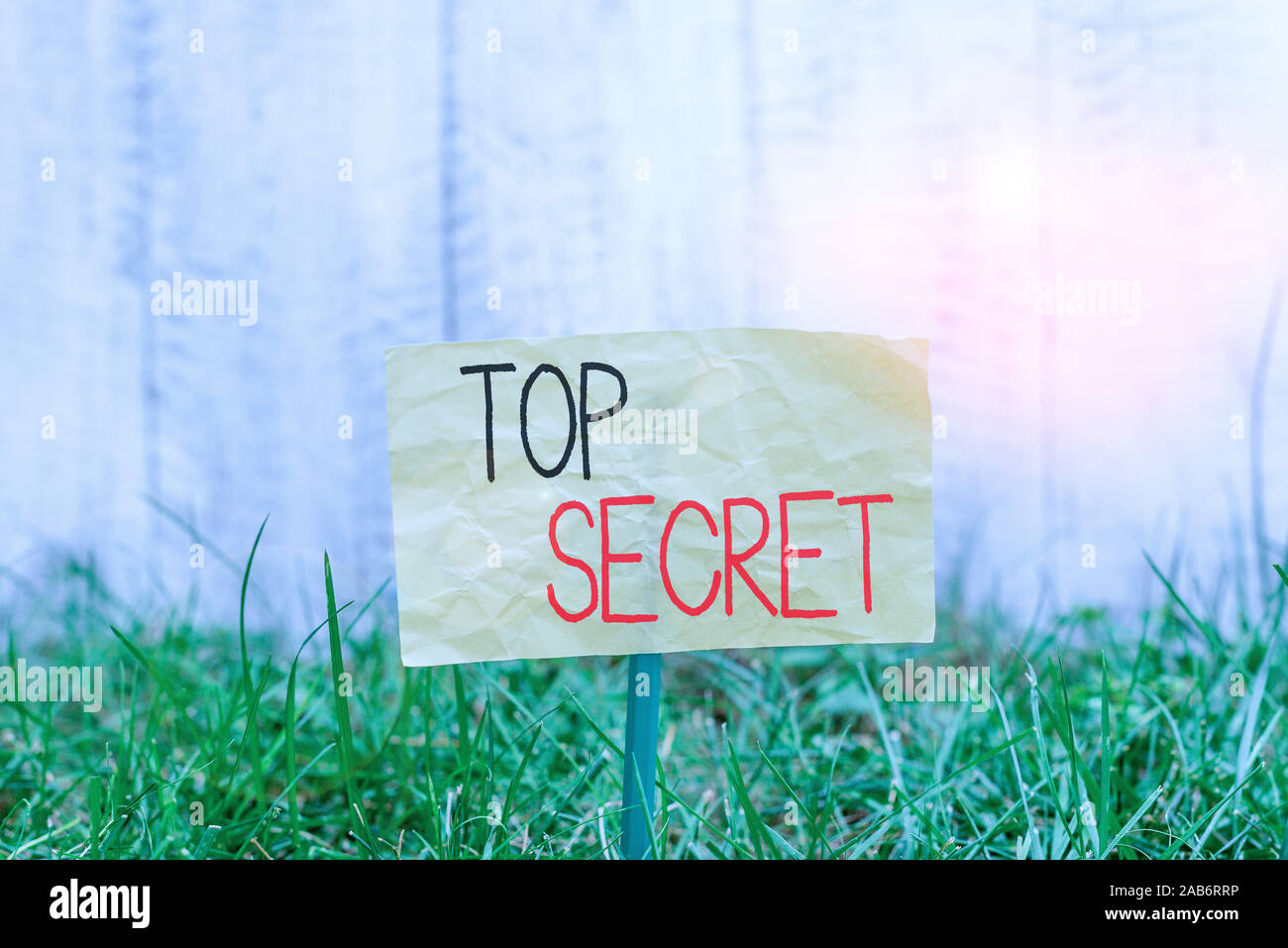 Handwriting text writing Top Secret. Conceptual photo protected by a ...
