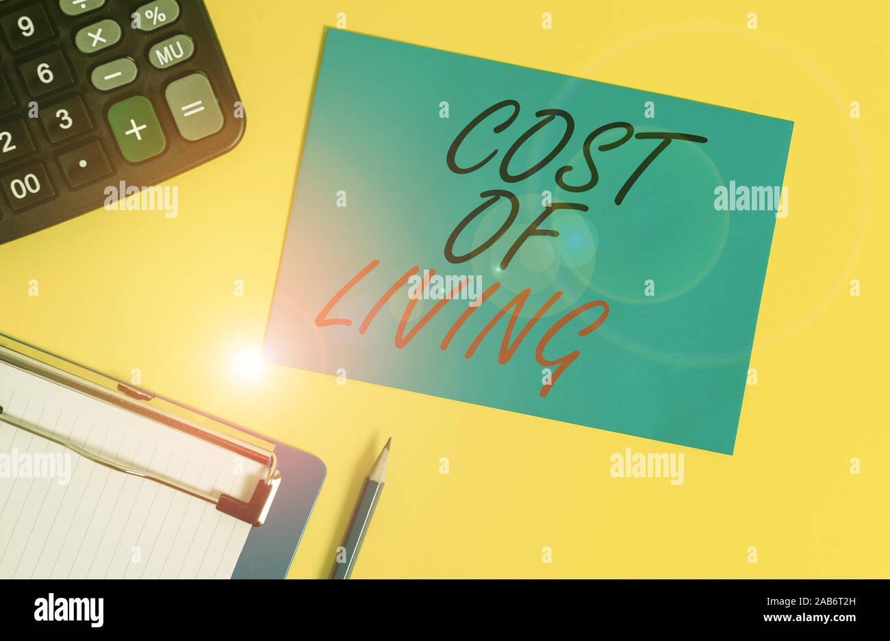 Writing note showing Cost Of Living. Business concept for The level of ...