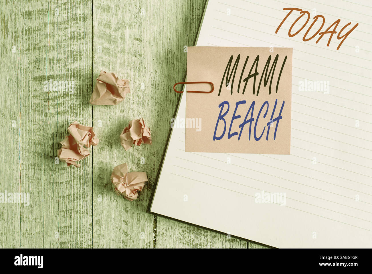 Writing note showing Miami Beach. Business concept for the coastal ...