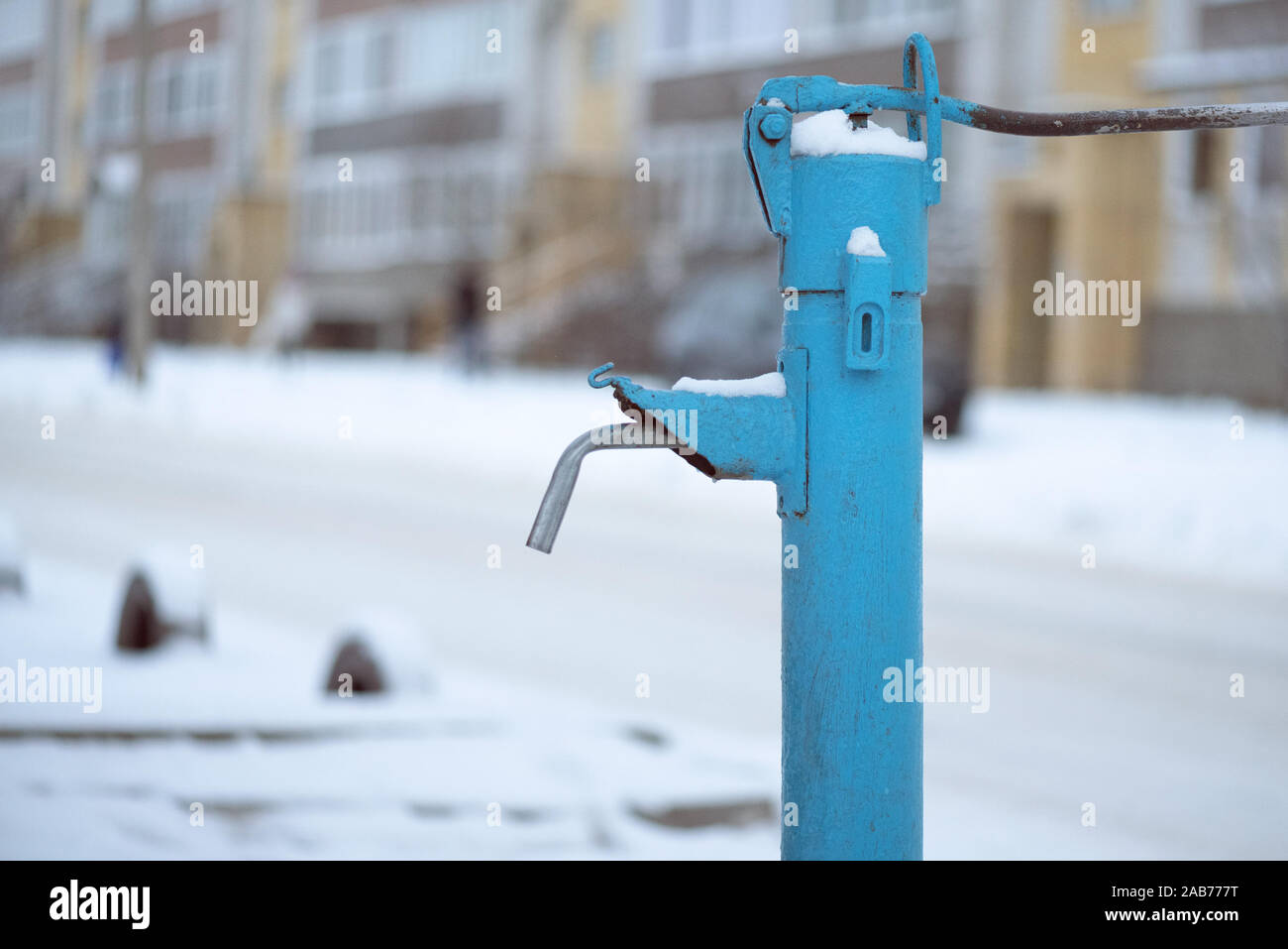 Old street water pipe stand on modern living house background Stock ...