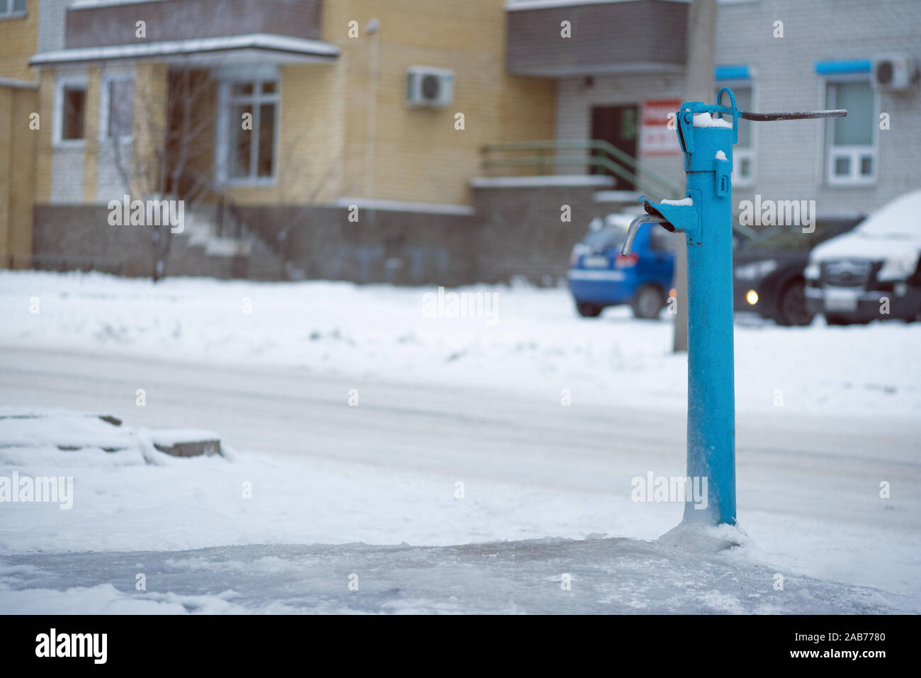 Old street water pipe stand on modern living house background Stock ...