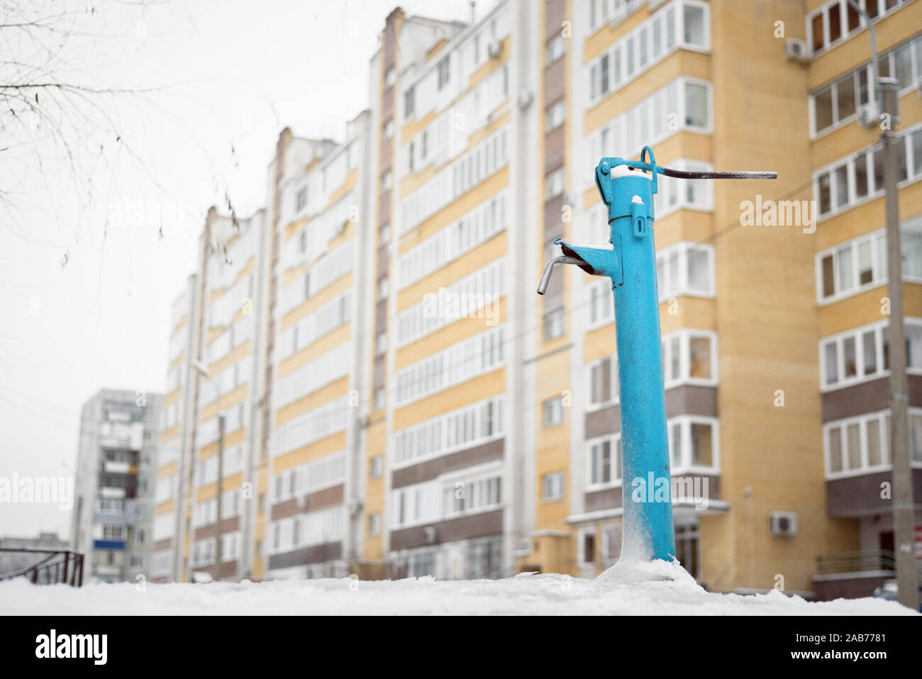 Old street water pipe stand on modern living house background Stock ...