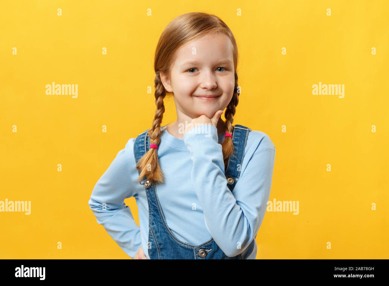 Close-up portrait of a cute, curious, smart, attractive, little girl ...