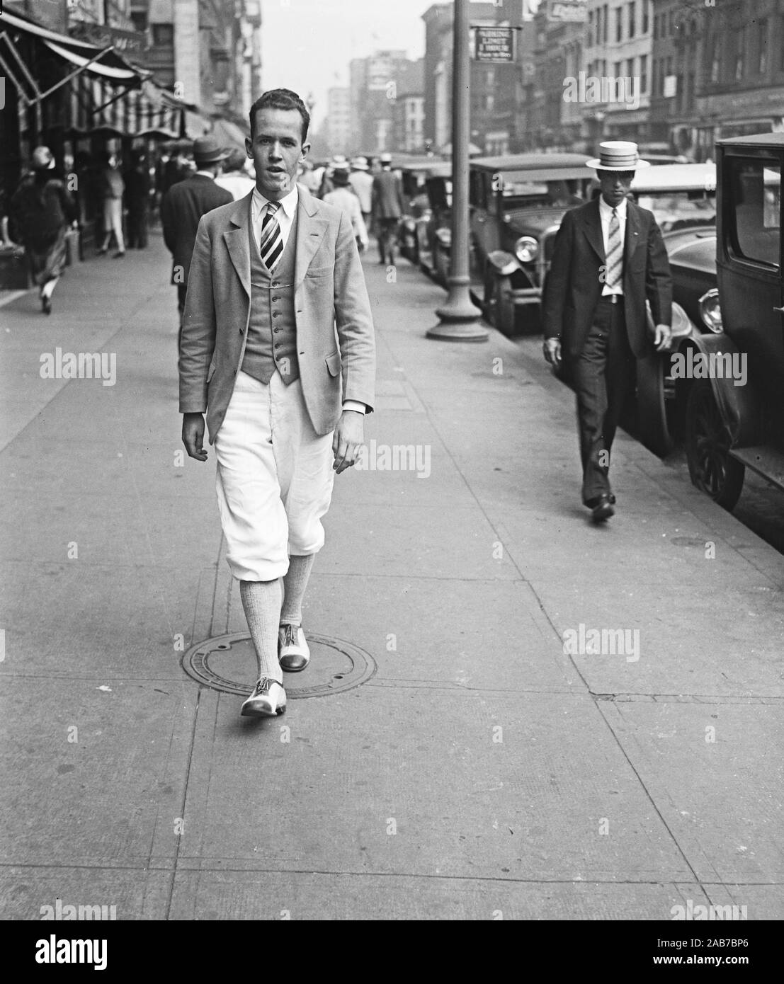 1920s man walking Black and White Stock Photos & Images - Alamy