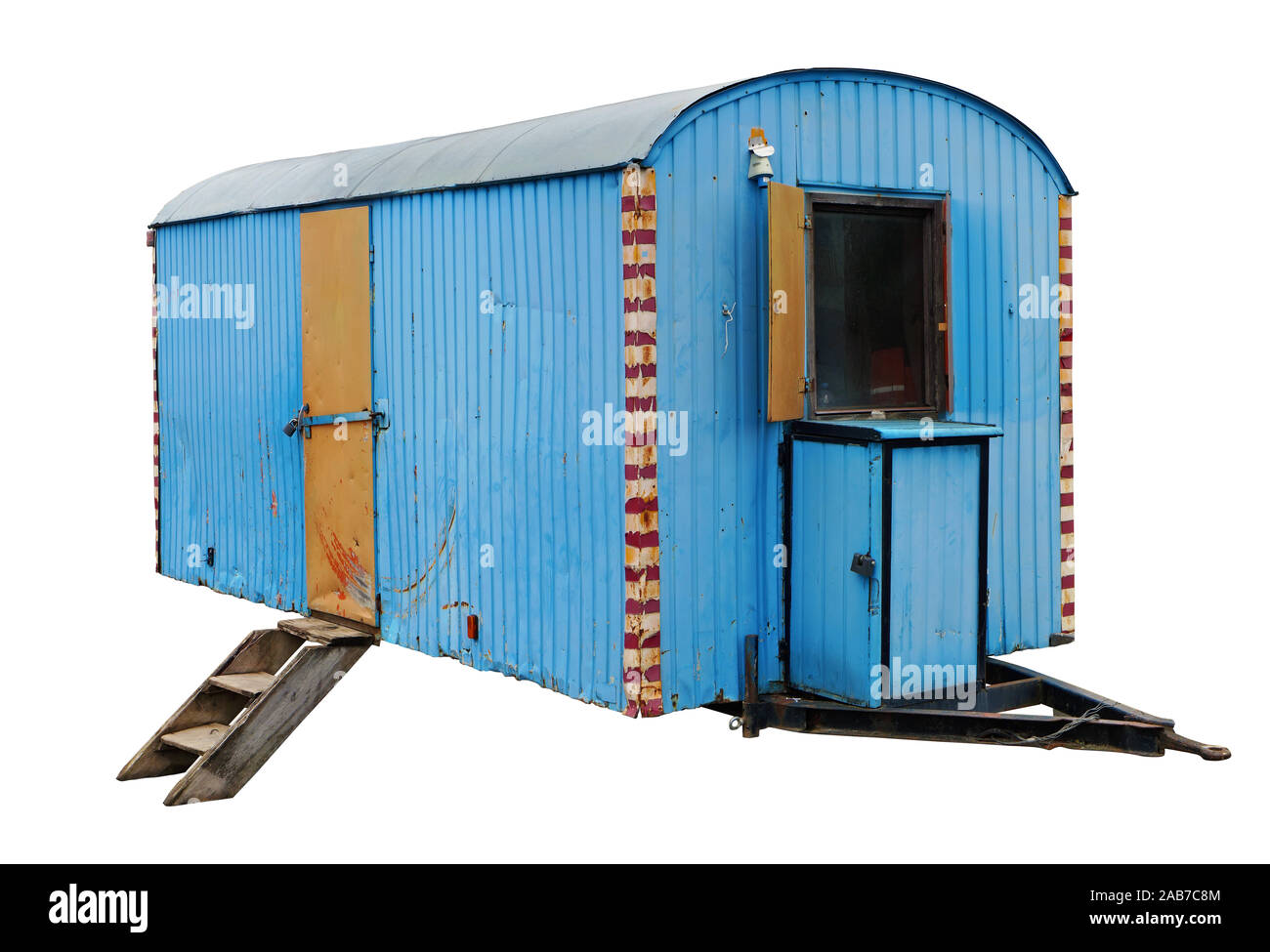 An old aged steel blue trailer was once used to transport circus ...