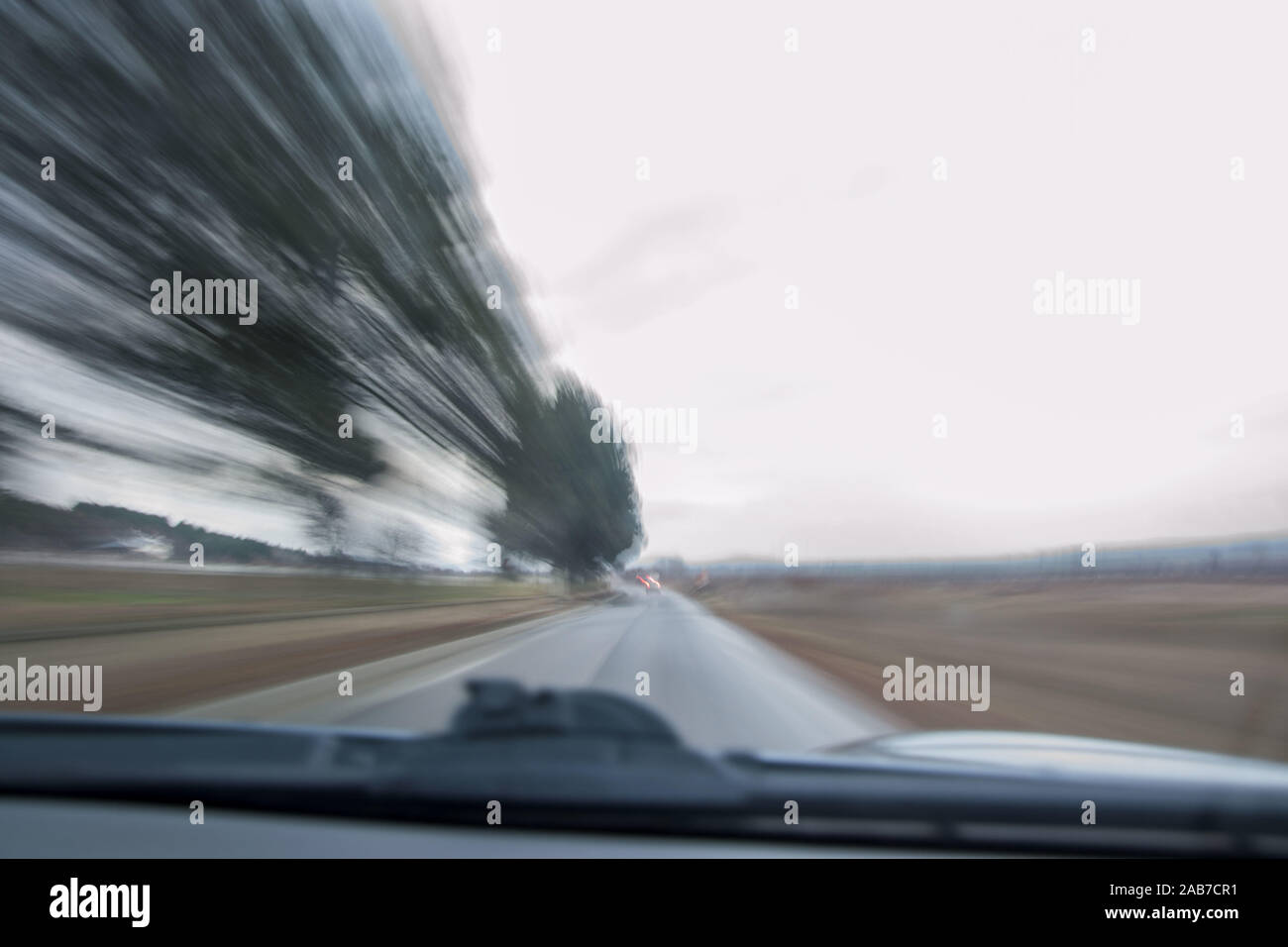 The traffic in the city, car driving, motion blur, sensation of speed ...
