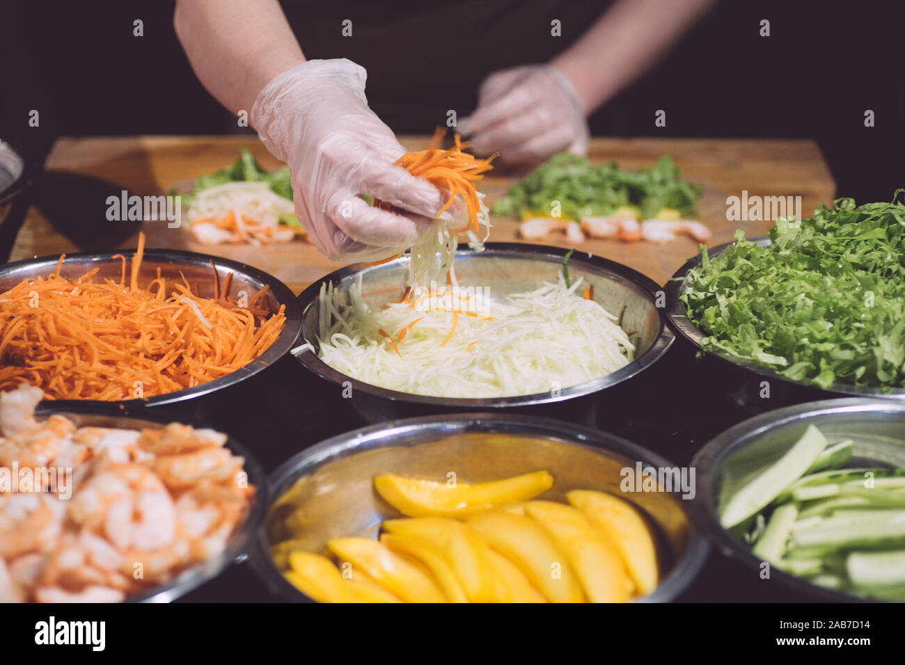Vietnamese street food on the market in Vietnam. Spring Roll Cooking ...