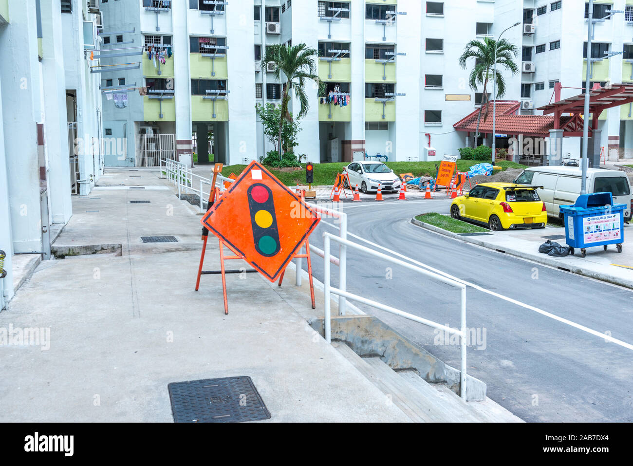 Traffic light caution signboard warning oncoming vehicles Stock Photo ...