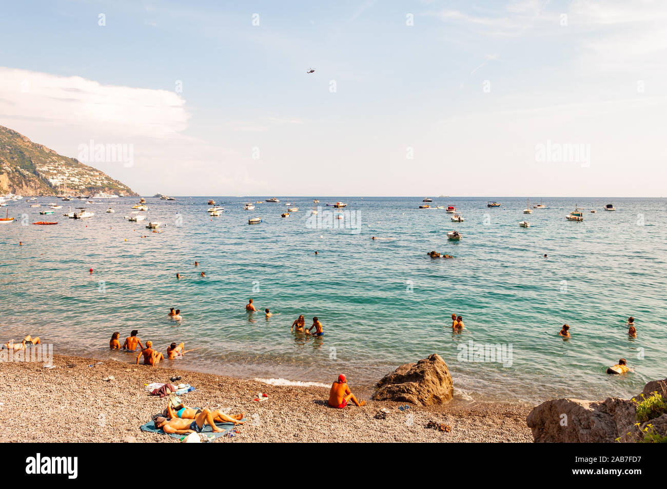 Positano, Italy - September 05, 2019: People resting, sunbathing and ...