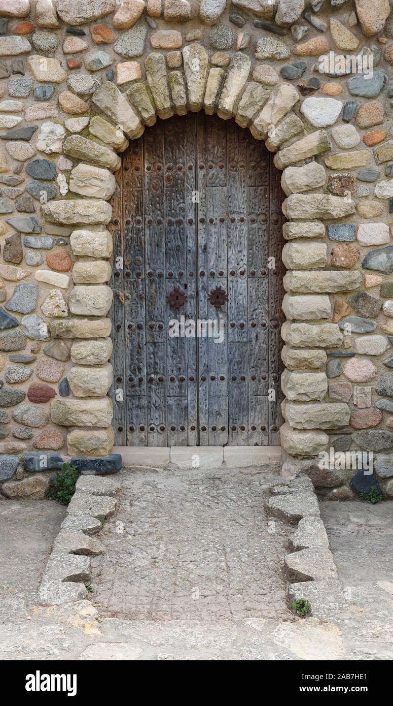 Old-fashioned entrance of the stone building Stock Photo - Alamy