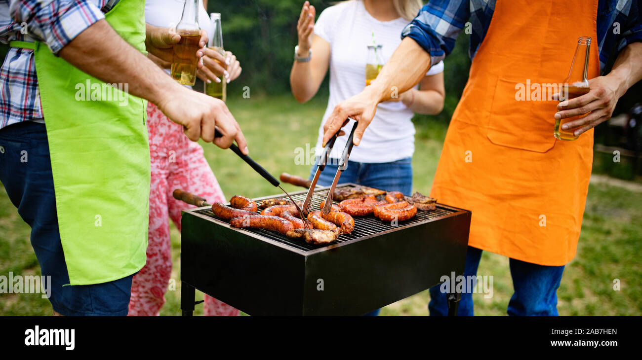 Group friends doing bbq in hi-res stock photography and images - Alamy