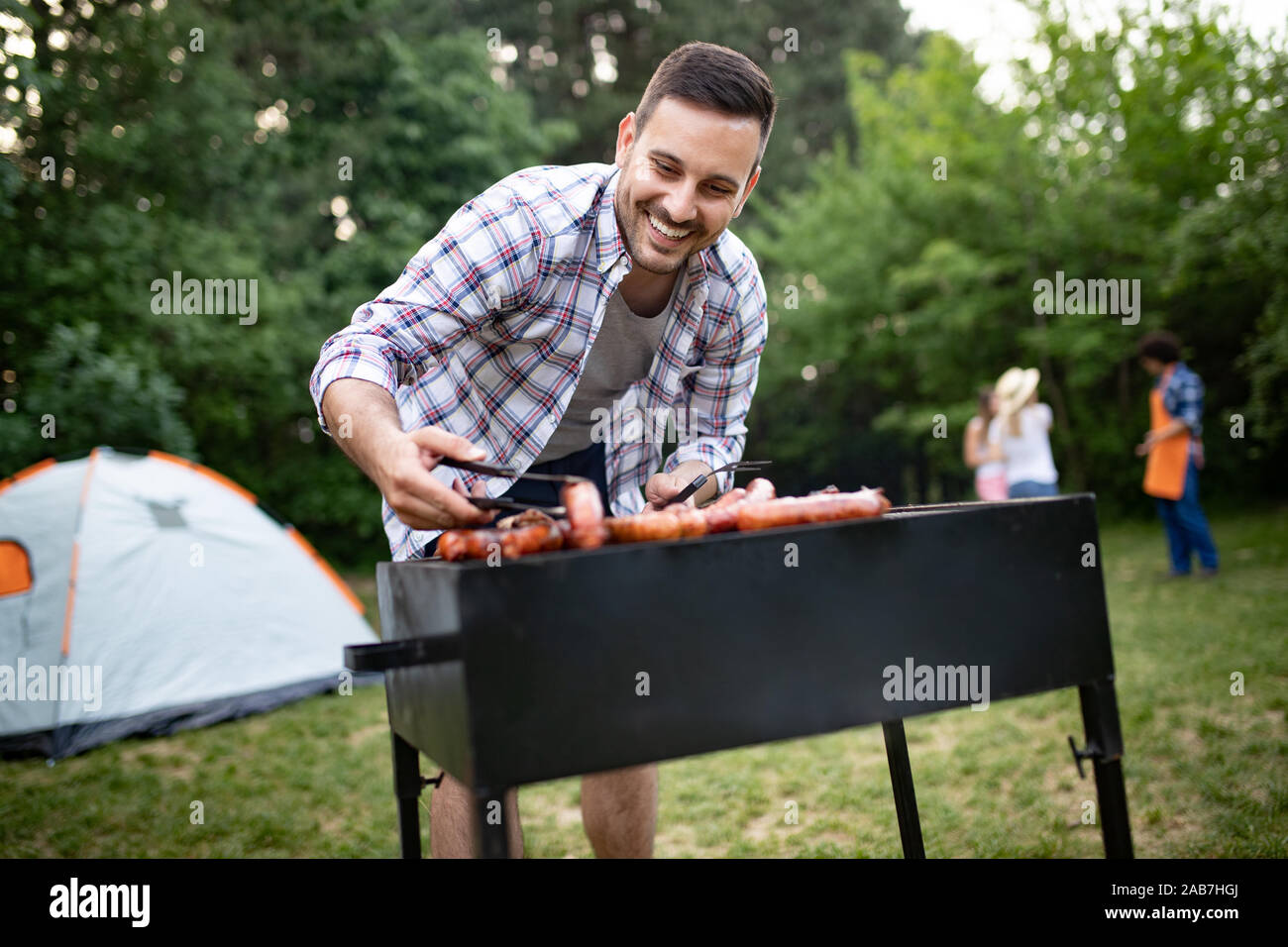 Man and meat and dinner party hi-res stock photography and images - Alamy