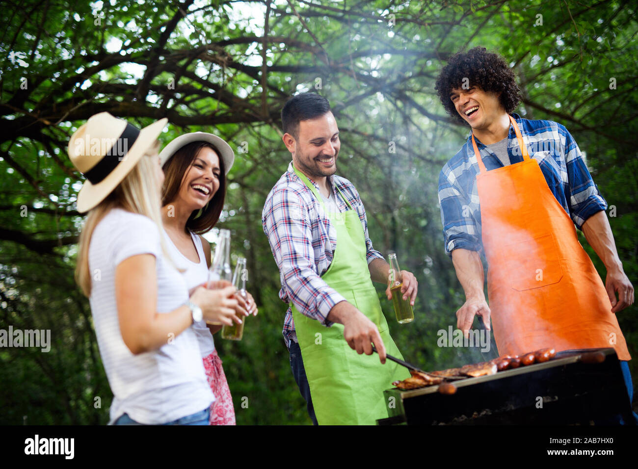 Group friends doing bbq in hi-res stock photography and images - Alamy
