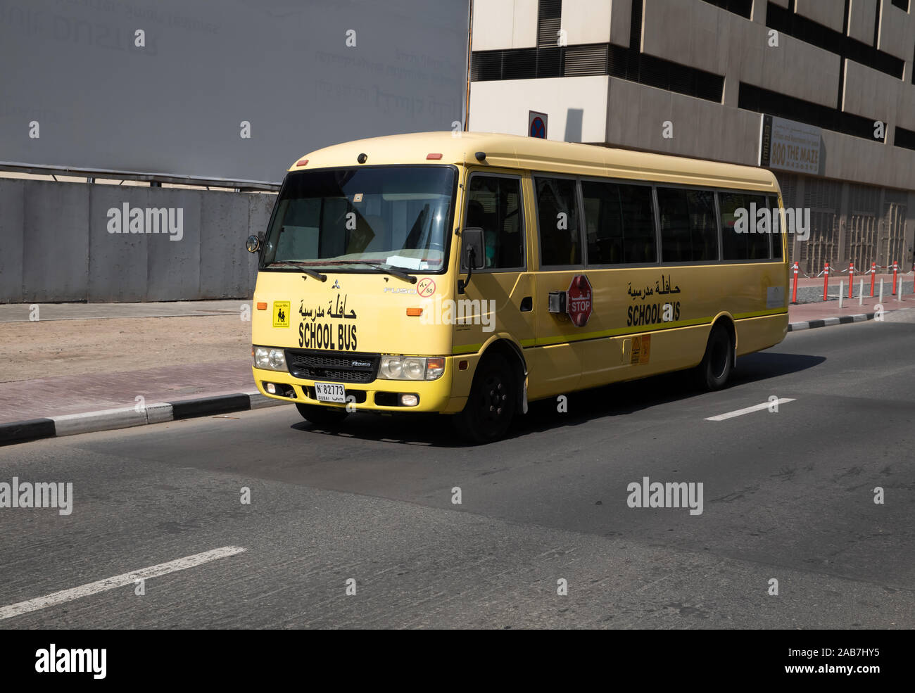 Yellow school bus in Dubai's Financial District, UAE Stock Photo - Alamy