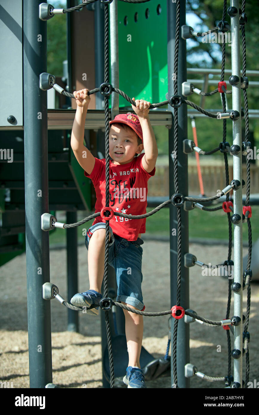 Boy on a rope ladder hi-res stock photography and images - Alamy