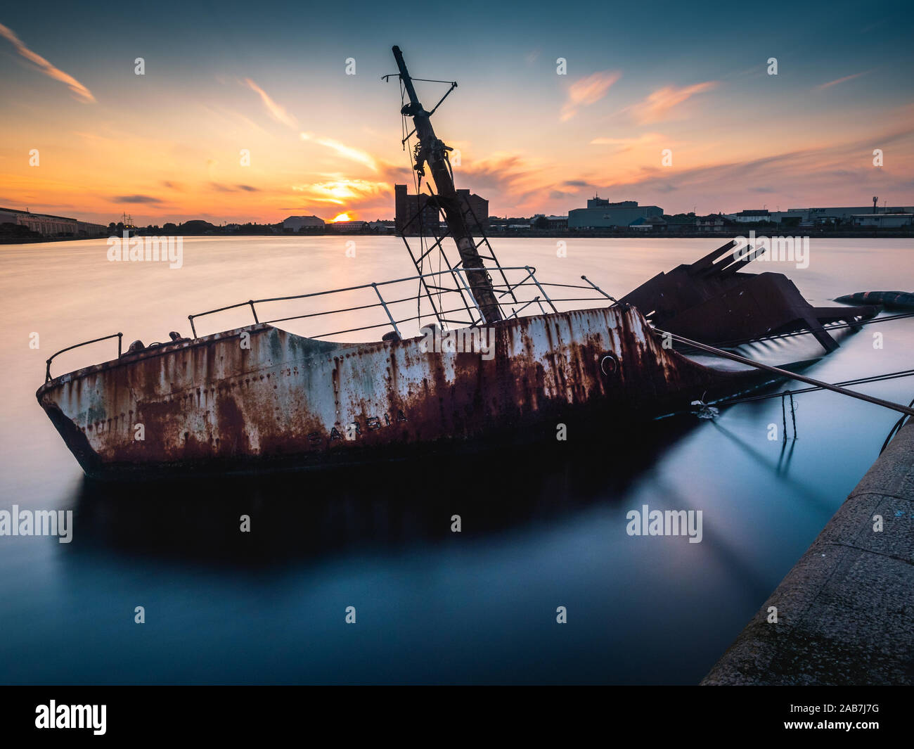 The wreckage of Sarsia Ship at Birkenheads east float docks Stock Photo ...
