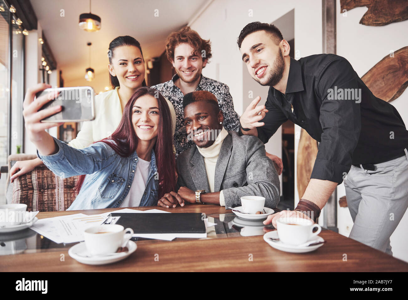 Selfie of young smiling people having fun together. Best friends taking ...