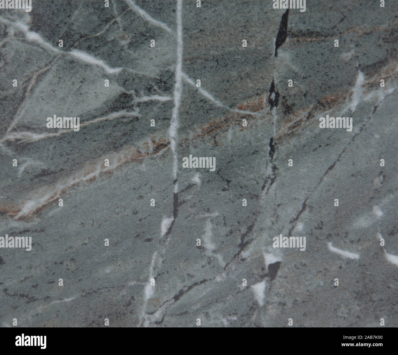 Dark gray marble with light veins, natural stone texture close-up ...