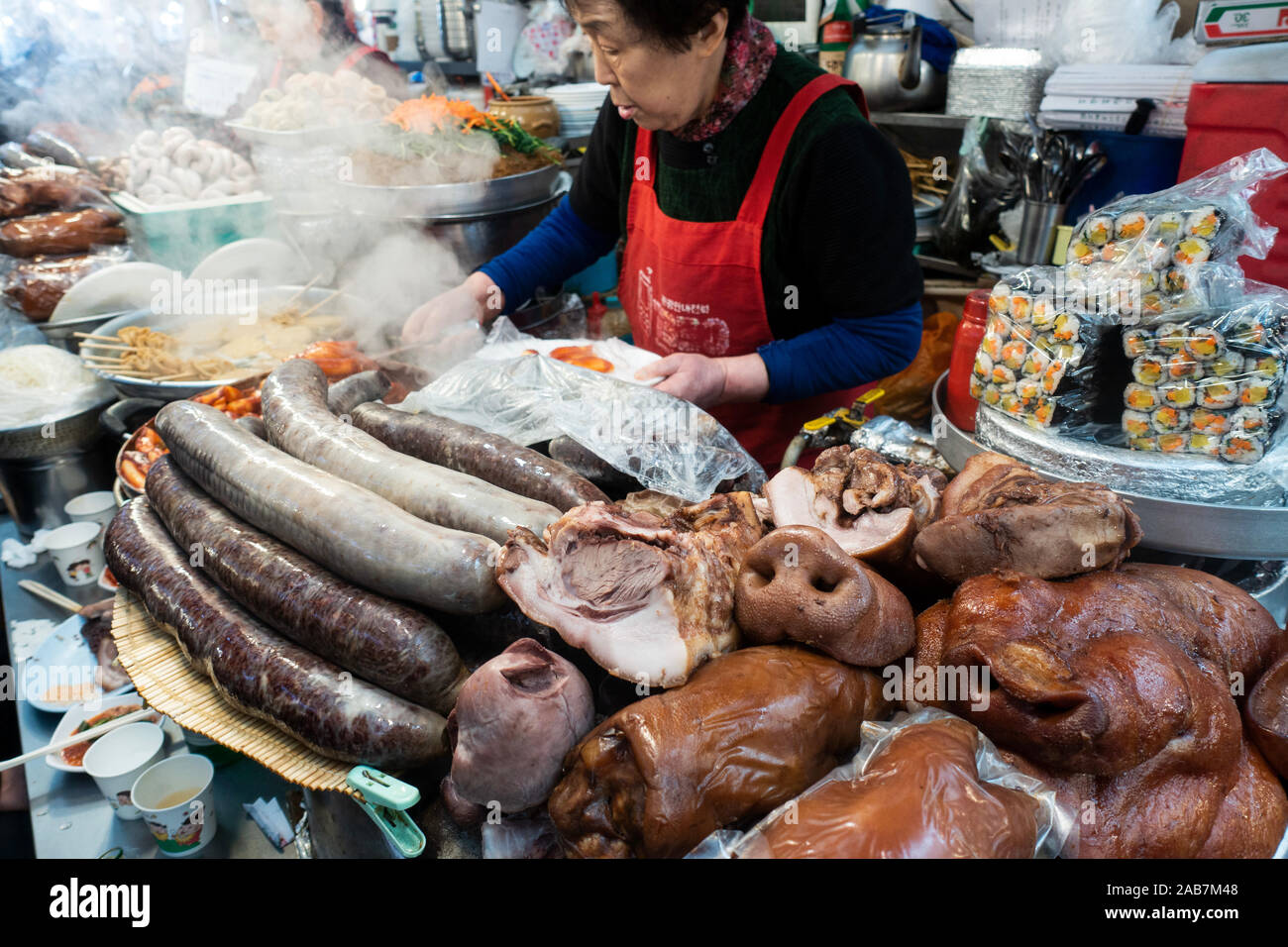 Korean woman cooking traditional hi-res stock photography and images ...