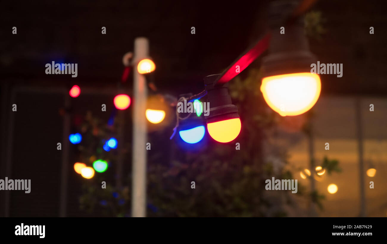 Colorful light bulbs on the string Stock Photo - Alamy
