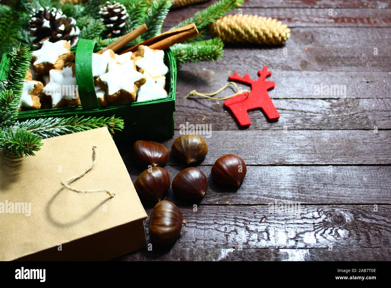 The picture shows a wonderful christmas decoration with sweet chestnuts ...