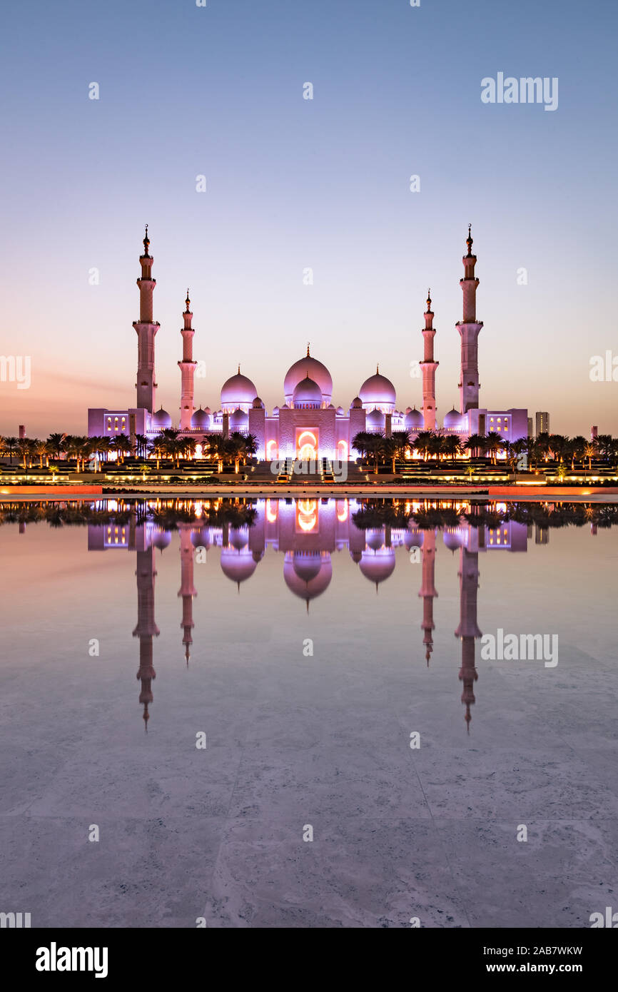 Abu Dhabi's magnificent Grand Mosque viewed in a reflecting pool, Abu ...