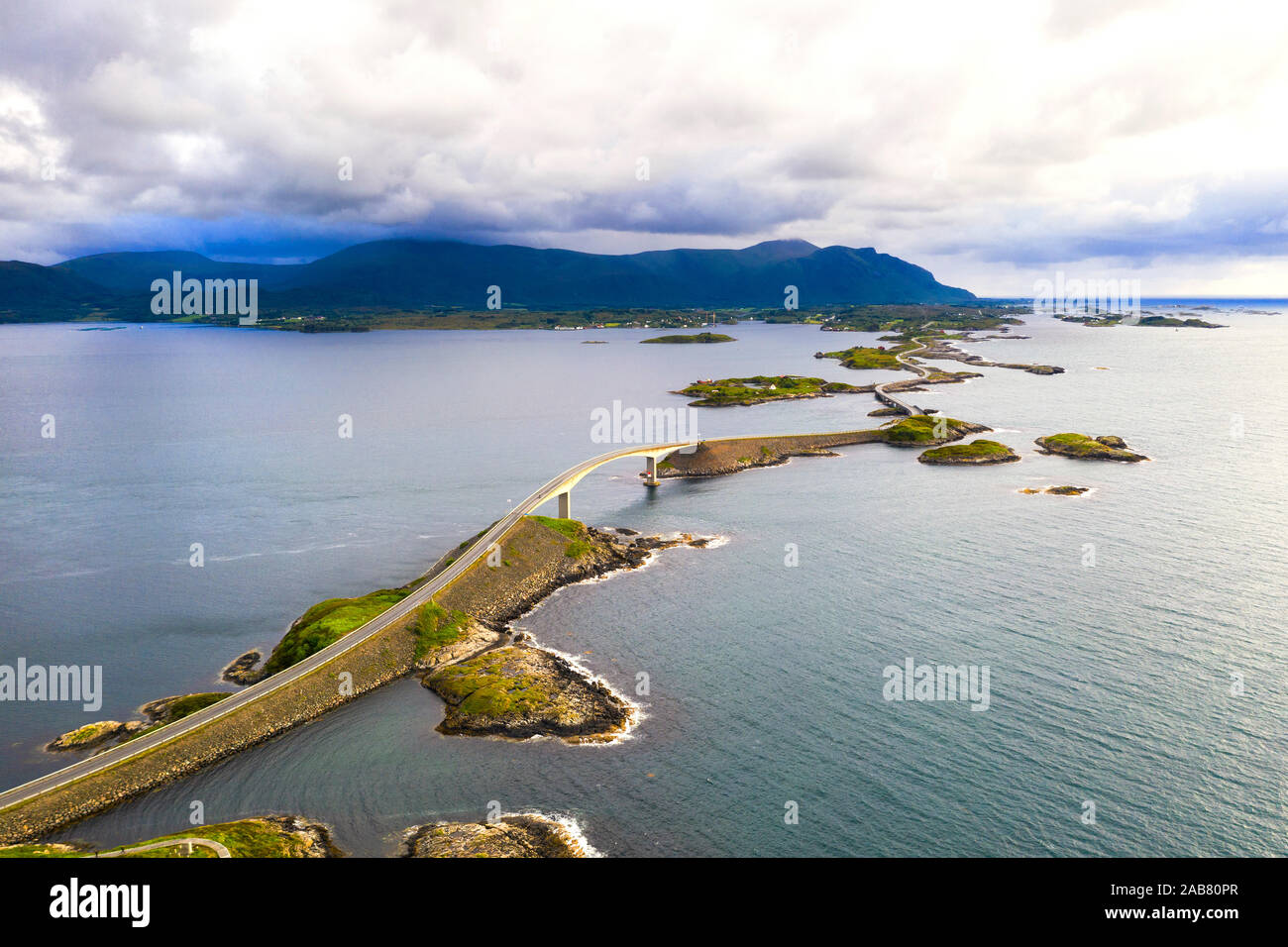 Aerial view of Storseisundet Bridge surrounded by sea and islets ...
