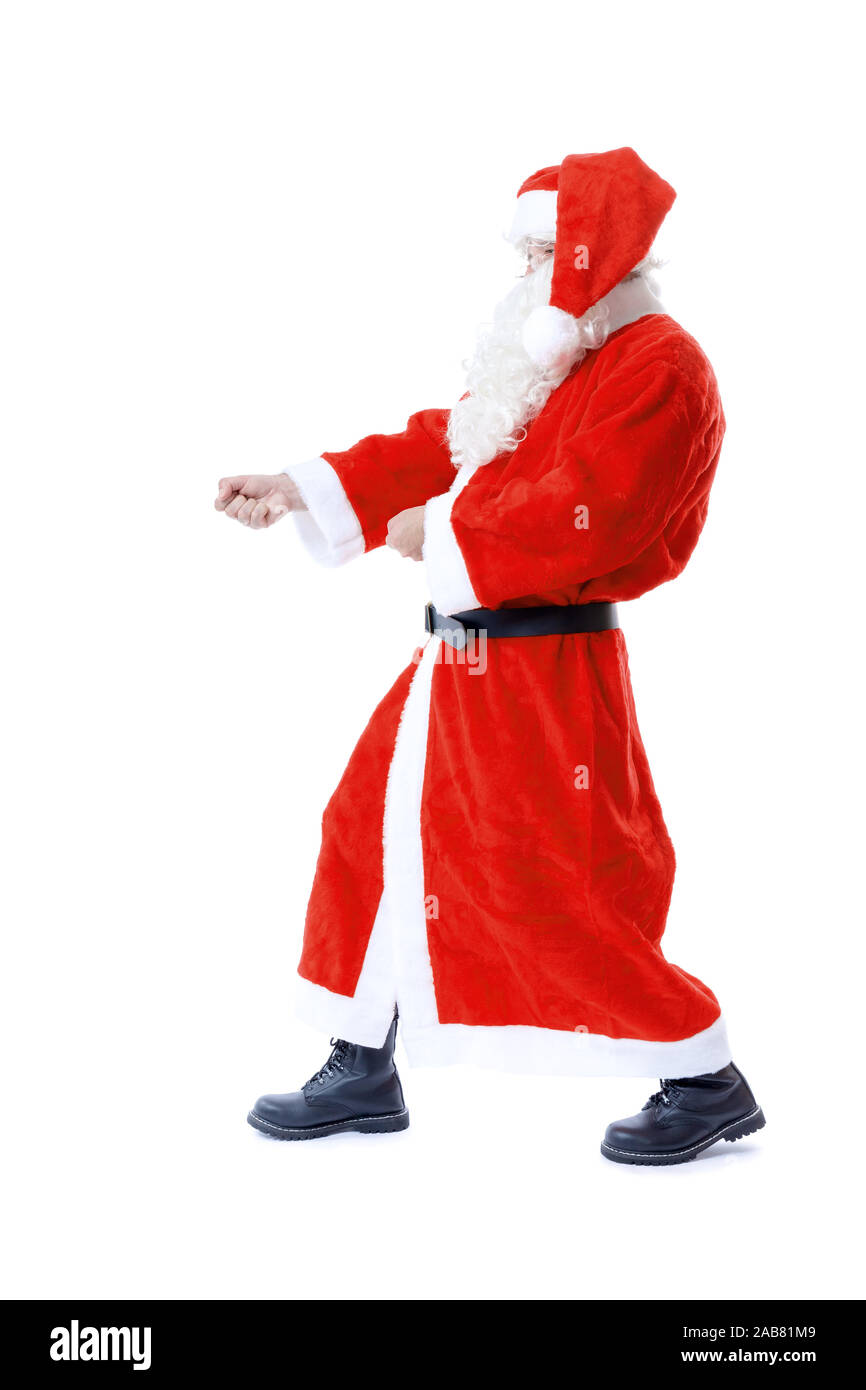 Santa Clause, der etwas hinter sich her zieht Stock Photo - Alamy