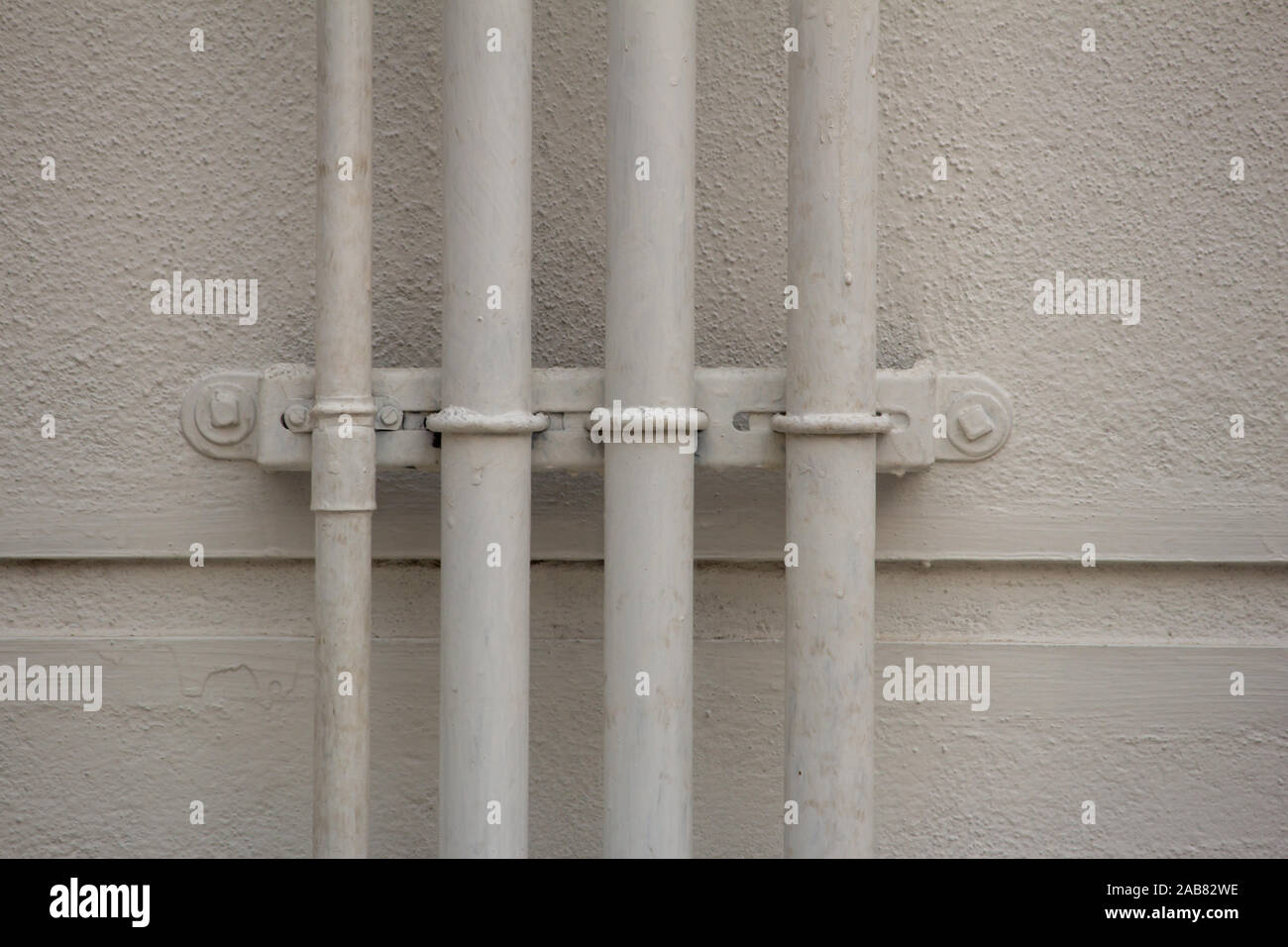 Close view of Pipe system installed in the concrete wall, water ...