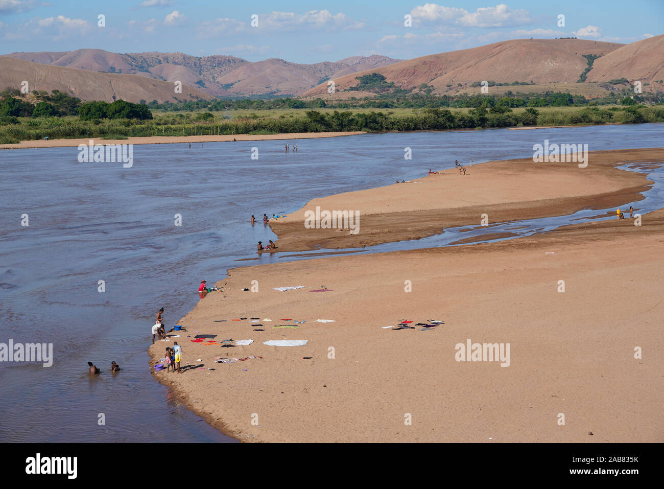 People washing clothes in the Manambolo River, Ambatolahy, Miandrivazo ...
