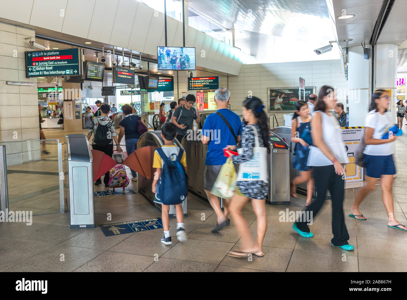 Asia/Singapore - Nov 22, 2019 : Passengers entering and exiting gantry ...