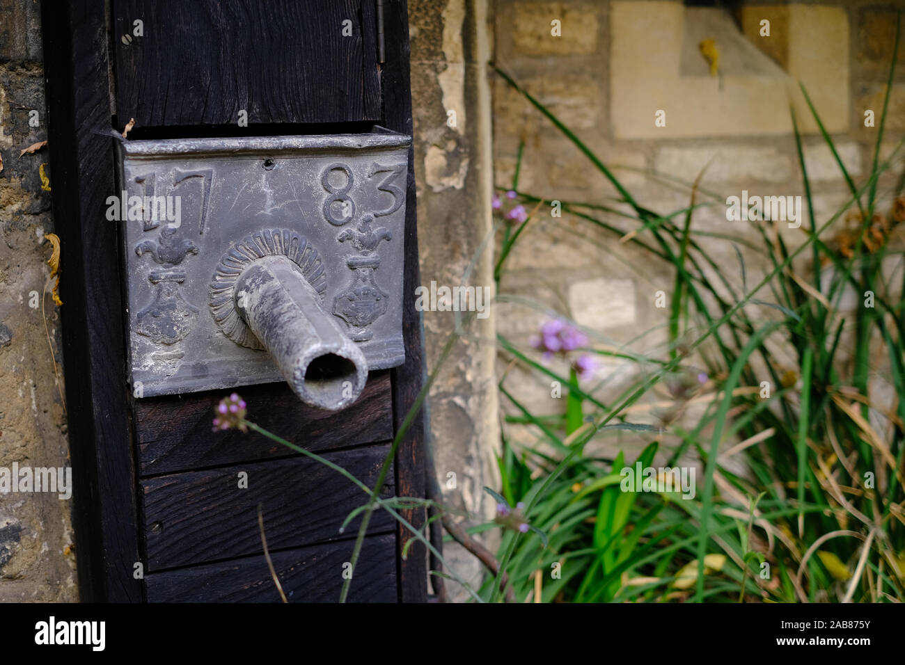 Ancient water spout at St Edmund Hall, part of Oxford University Stock ...