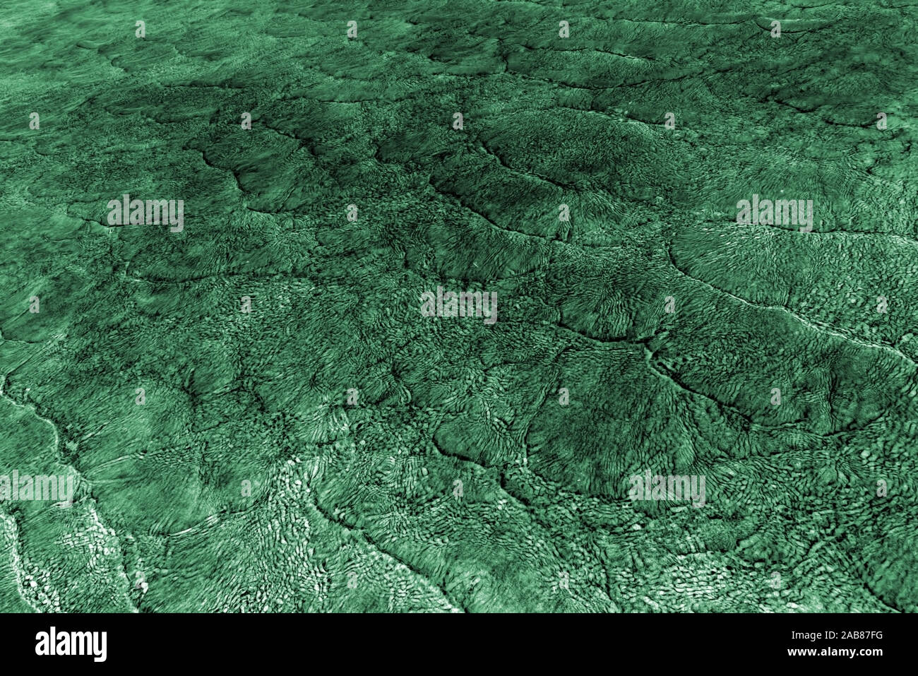 Empty abstract background naturally created by small sea waves in ...