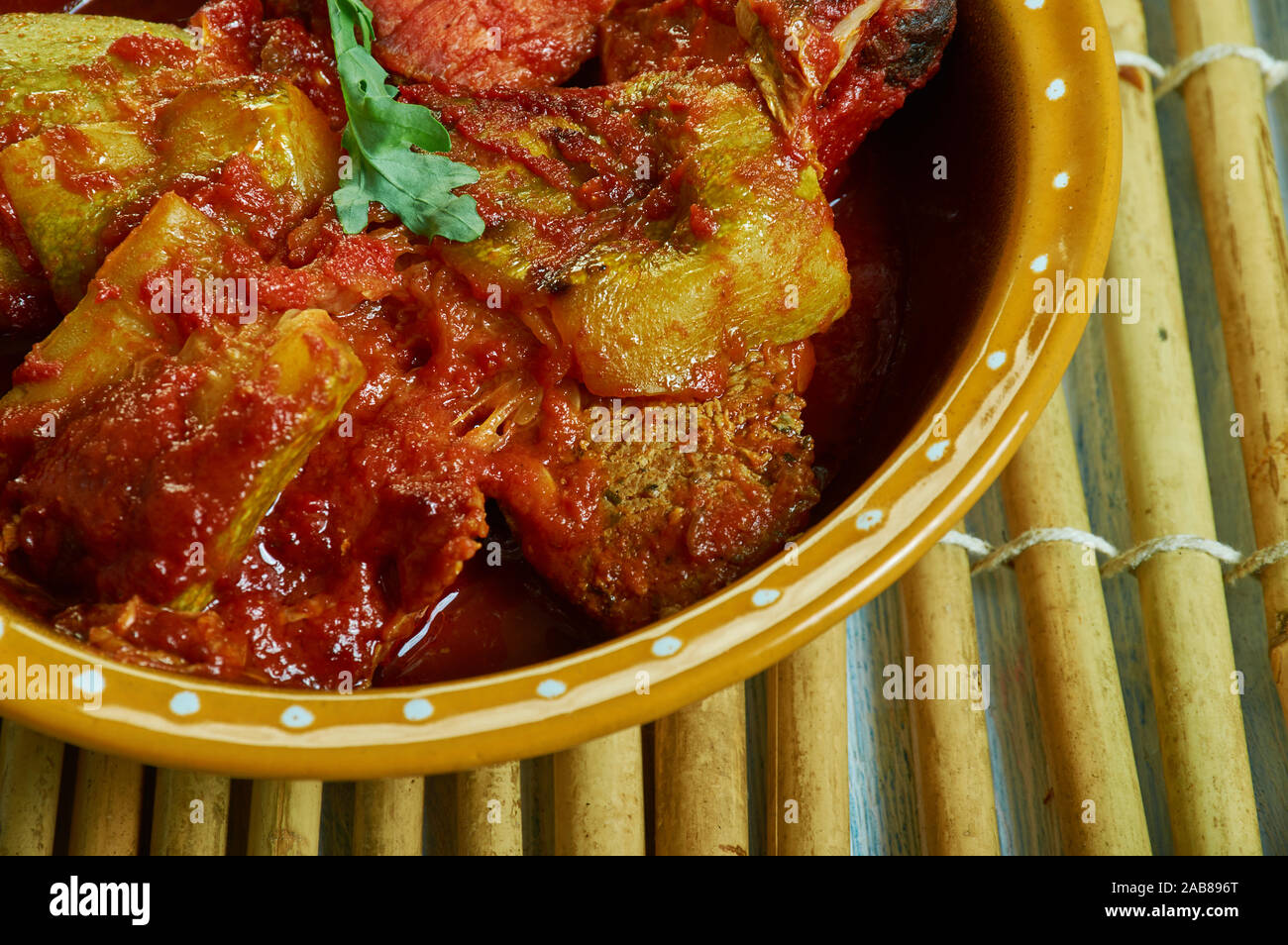 Carne de cerdo en pipian rojo, Pork in red sauce, Mexican cuisine Stock ...
