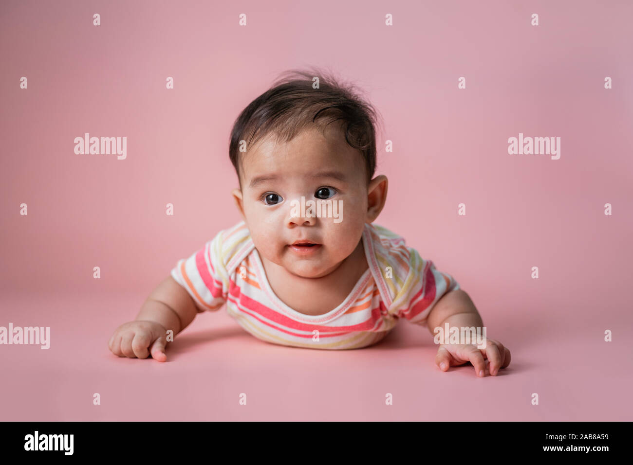 baby is on his stomach development Stock Photo - Alamy