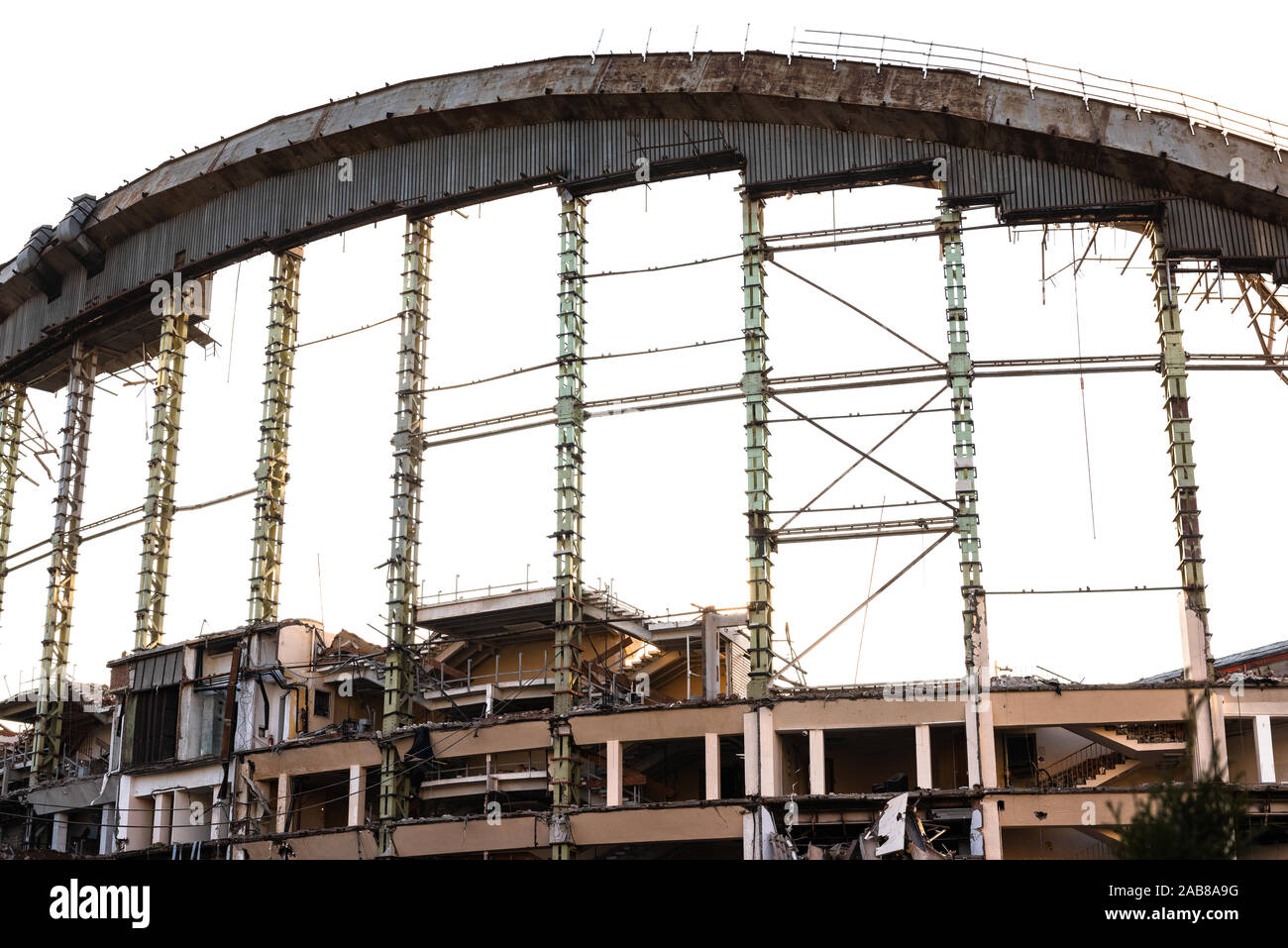 Demolition of the arena. Old metal frame of the building, destroyed ...