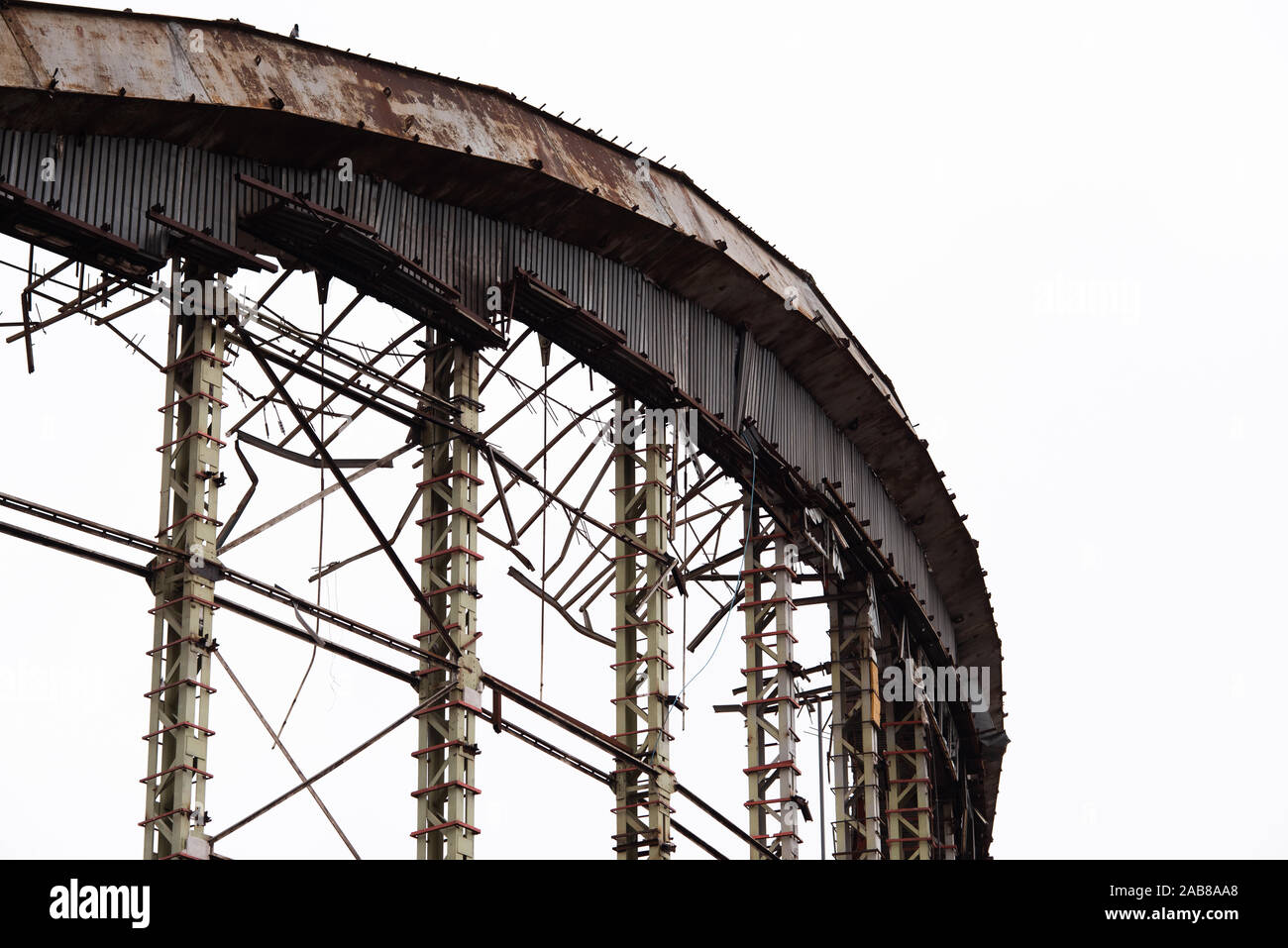Demolition of the arena. Old metal frame of the building, destroyed ...