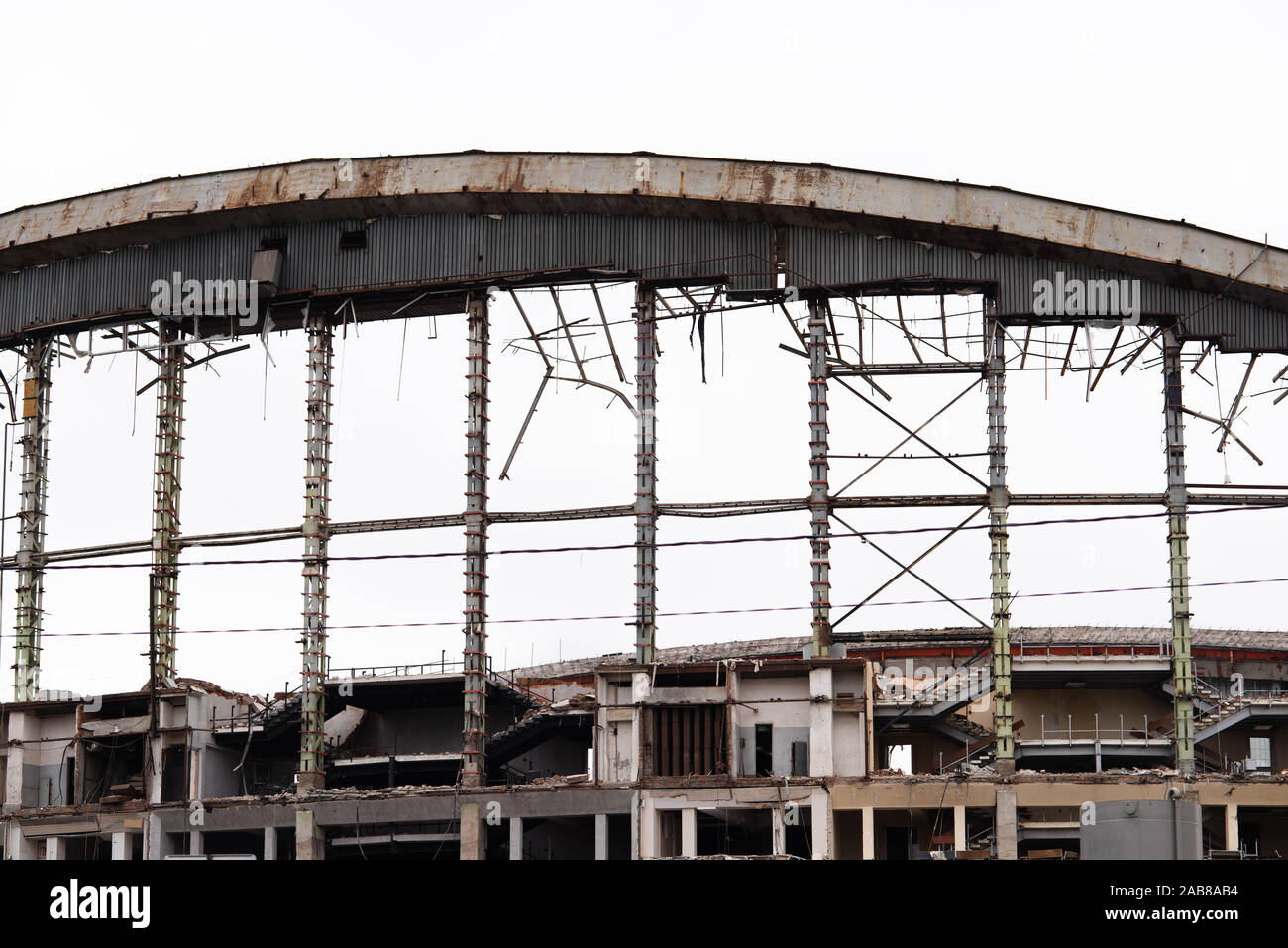 Demolition of the arena. Old metal frame of the building, destroyed ...
