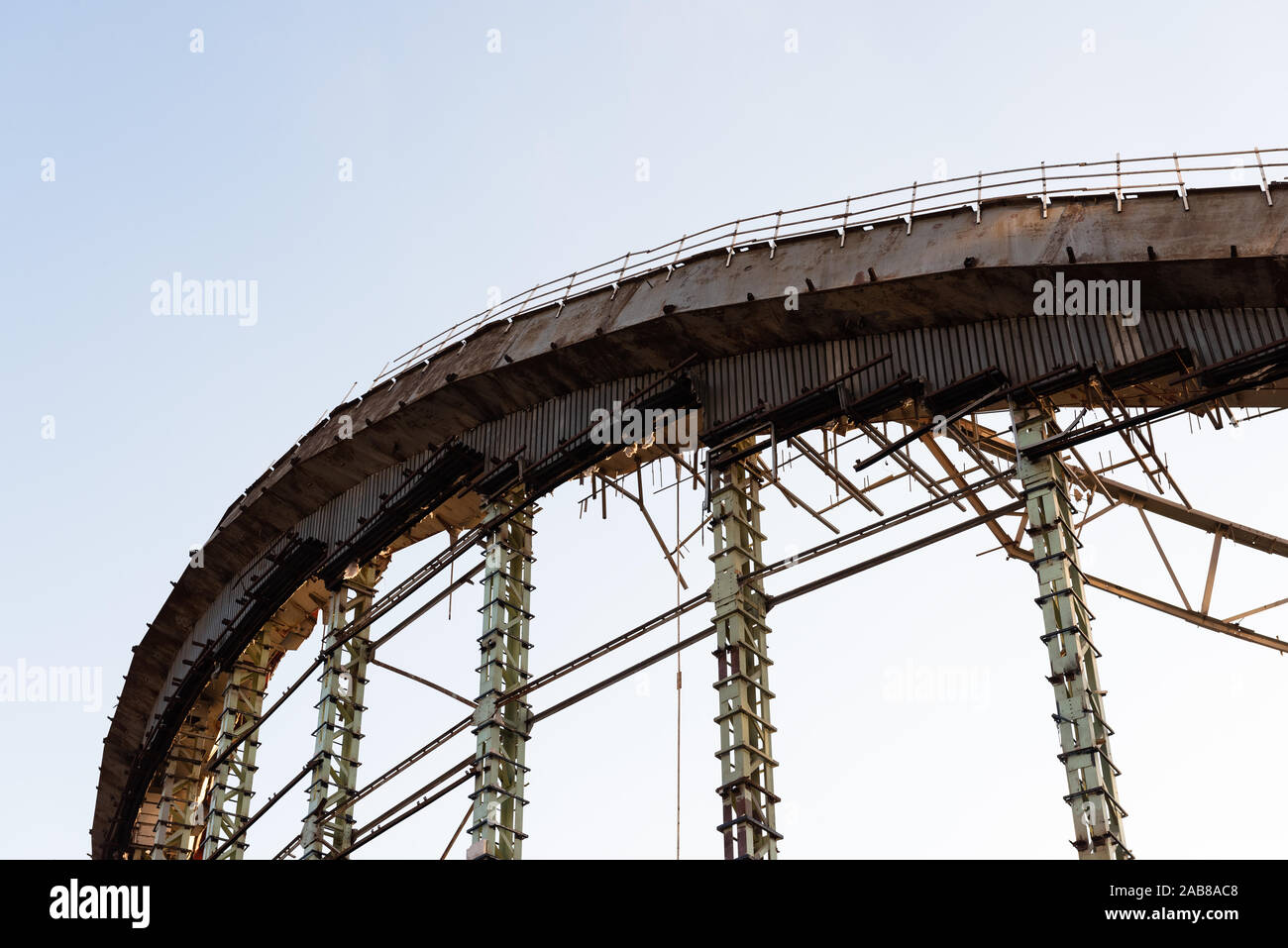 Demolition of the arena. Old metal frame of the building, destroyed ...