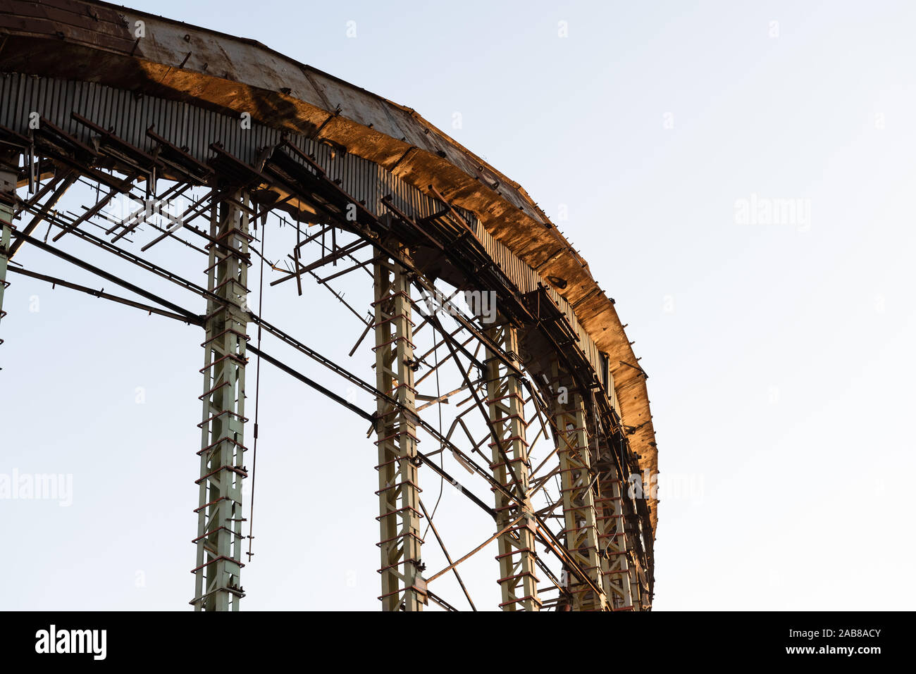 Demolition of the arena. Old metal frame of the building, destroyed ...