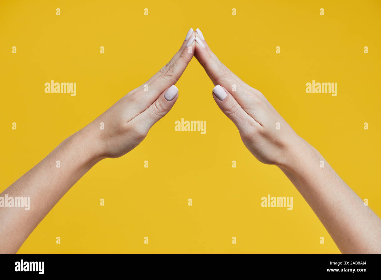 Creative hands protection house symbol hi-res stock photography and ...