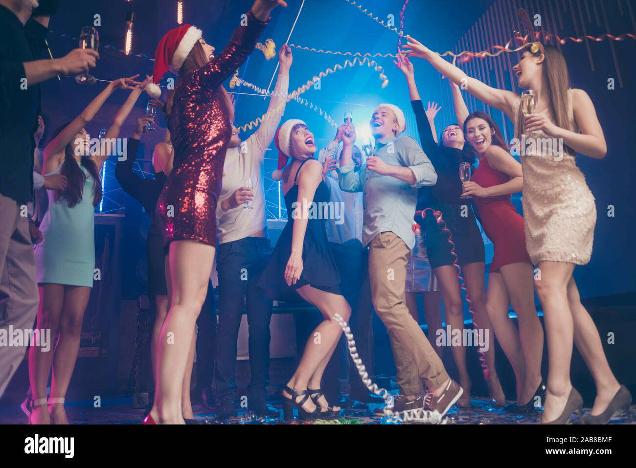 Crazy crowd gathering at home concept. Low below view photo of excited ...