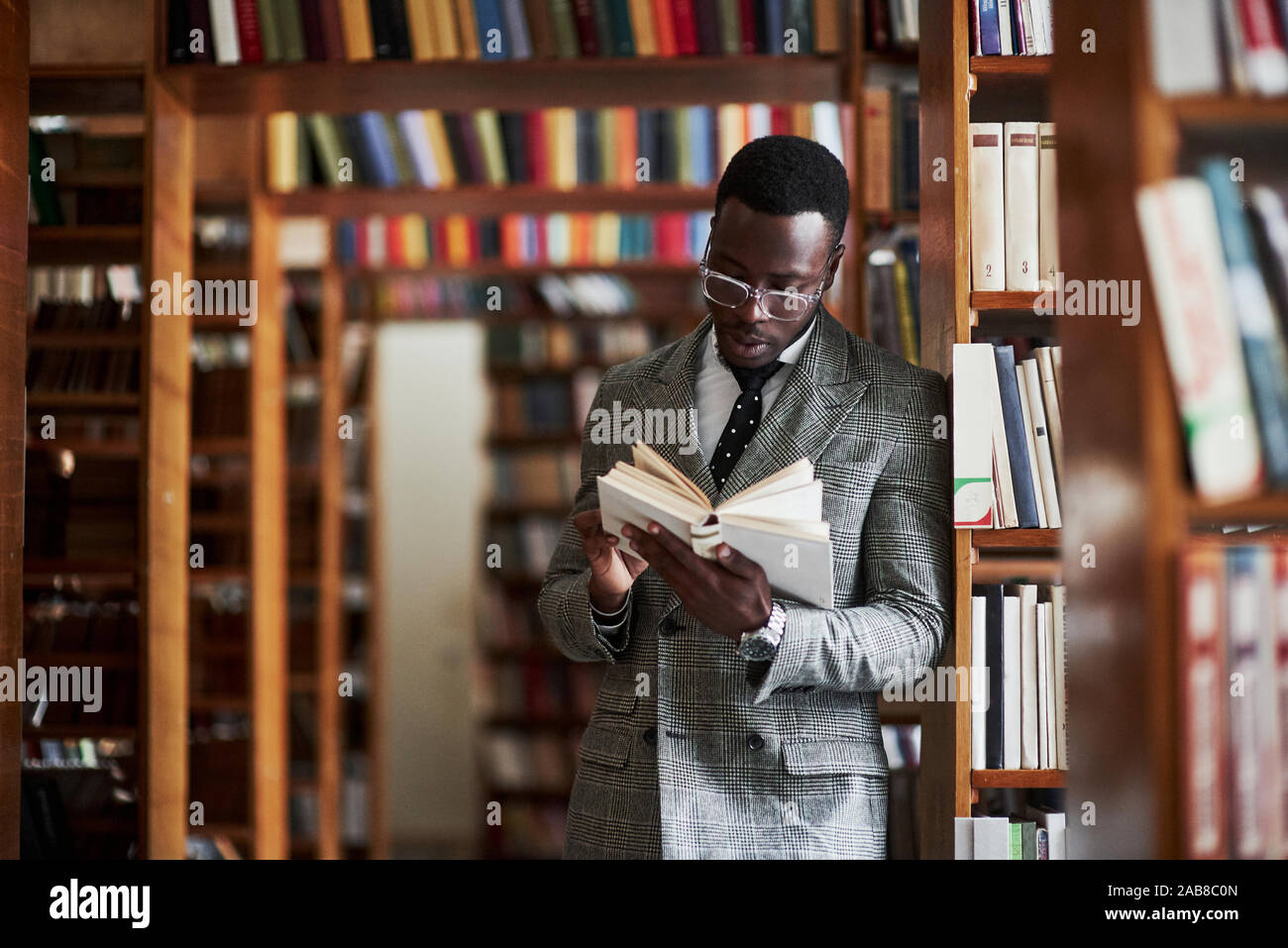 In library handsome african male hi-res stock photography and images ...