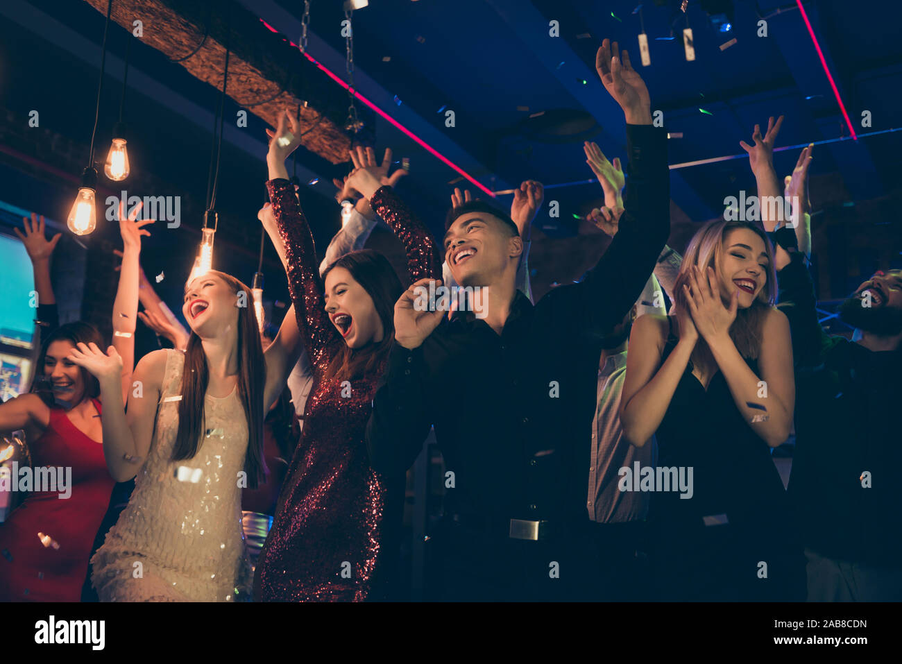 Photo of crazy chilling students dressed in formalwear putting their ...