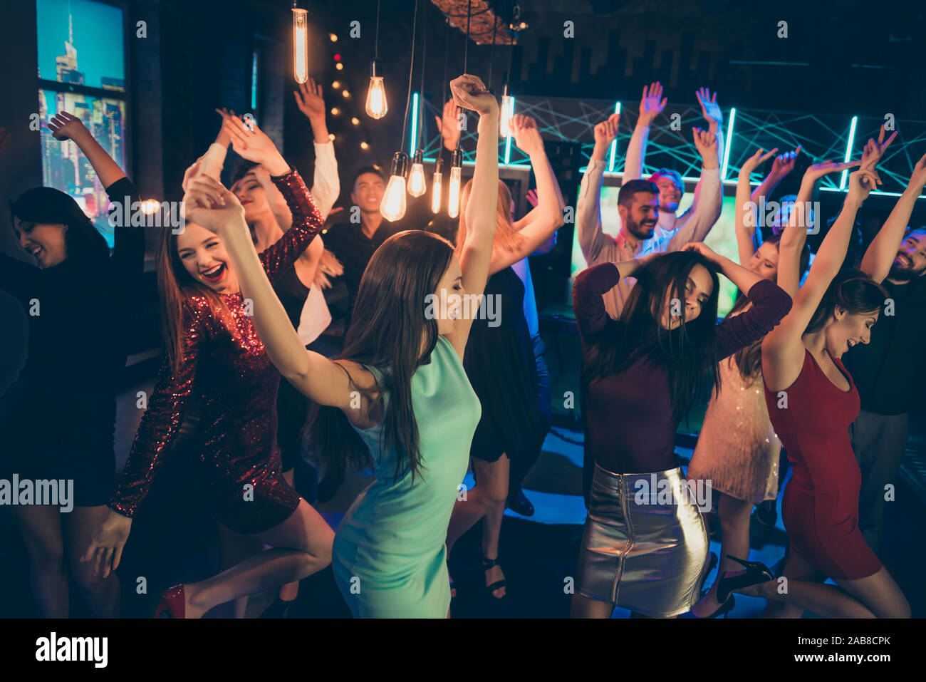 Lets party hard. Portrait of cheerful positive people and bachelorette ...