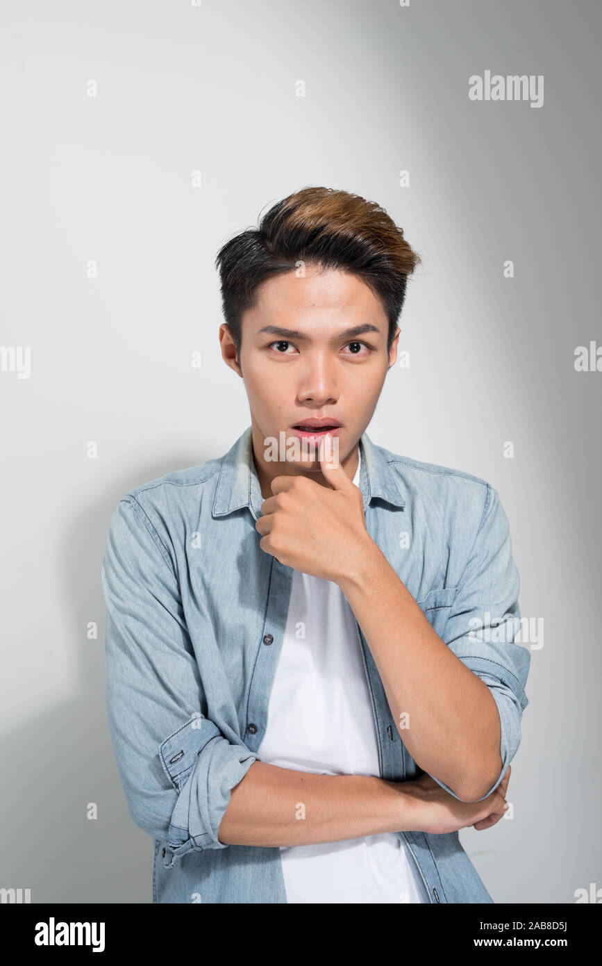 Closeup portrait of attractive young Asian man face Stock Photo - Alamy